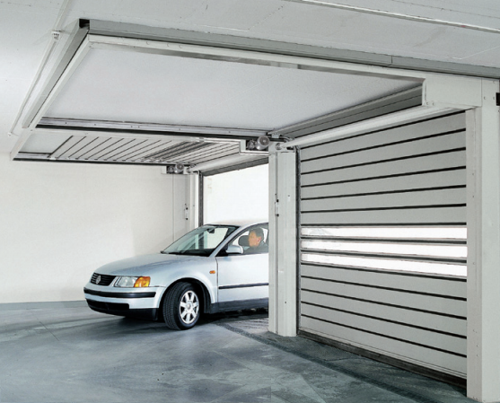 Low Headroom Sectional and Roll-Up Overhead Doors for Tight Spaces