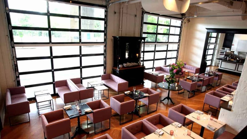 Elevate Your Restaurant or Storefront with Stylish Glass Garage Doors