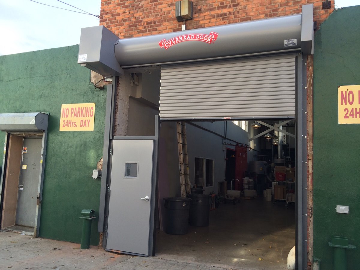 Swinging Pass Doors in Rolling Gates